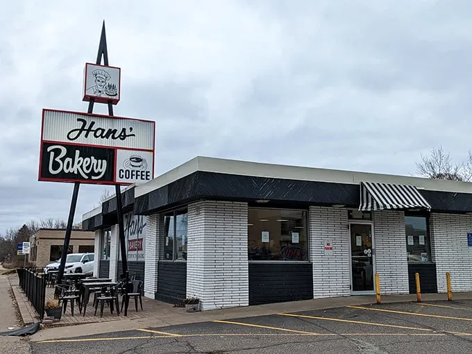 Welcome to carb heaven! Hans' Bakery's retro sign beckons like a siren call to donut lovers everywhere.