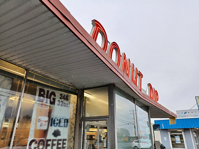 A retro sign that screams "donut paradise"! Donut Dip's exterior is like a time machine to simpler days when calories didn't count and sprinkles were a food group. 