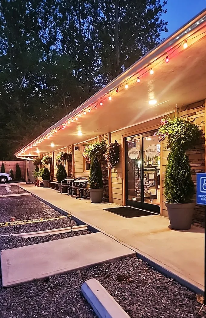 Welcome to flavor town! Americano's charming exterior, with its vibrant flowers and twinkling lights, promises a feast for both eyes and taste buds.
