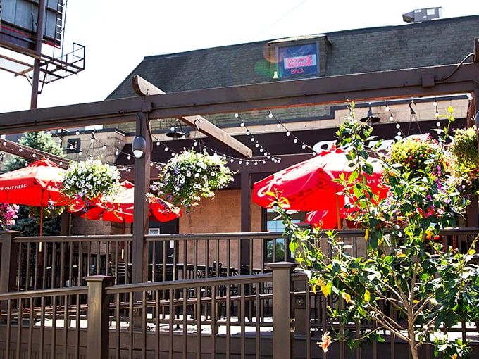 The unassuming stone fortress of flavor stands proudly on State Street, its patio beckoning with colorful hanging baskets—Milwaukee's worst-kept culinary secret.