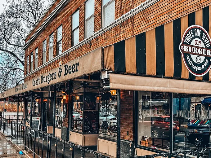 Step into burger paradise! This charming brick facade promises a feast for the senses, with that striped awning waving you in like a friendly neighbor.