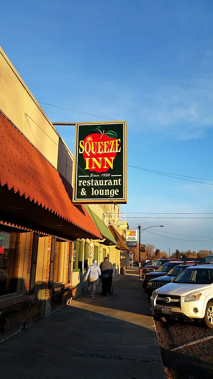 The Squeeze Inn: Where time-honored tradition meets mouthwatering steaks. This unassuming exterior hides a world of flavor waiting to be discovered.