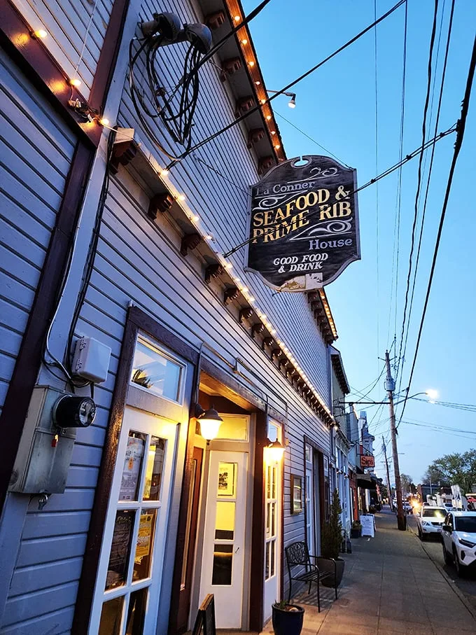 A beacon of culinary delight! This charming exterior promises a feast for the senses, with its inviting glow and classic small-town charm.