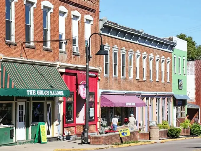 Colorful storefronts that look like they were designed by Wes Anderson during his most optimistic phase. Small-town charm with big personality.
