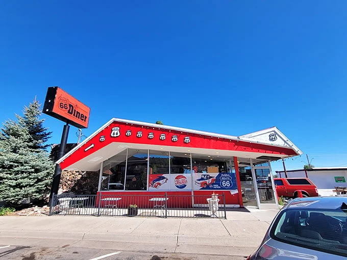 A slice of Americana, served with a side of nostalgia! Goldies Route 66 Diner stands proud, its red exterior as inviting as a warm cherry pie on a windowsill.