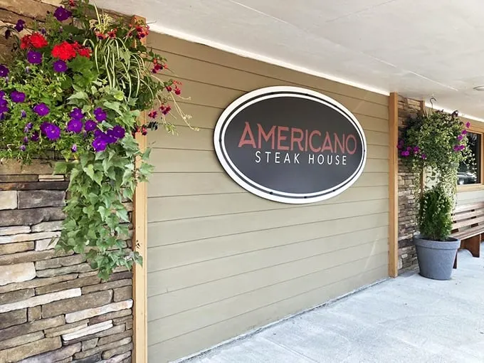 Welcome to flavor town! Americano's charming exterior, with its vibrant flowers and twinkling lights, promises a feast for both eyes and taste buds.