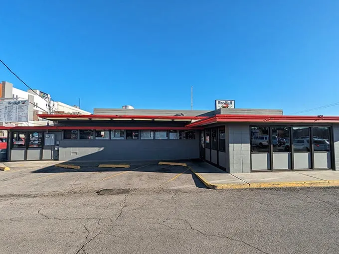 Welcome to burger paradise! Hires Big H stands proud, its retro sign a beacon of hope for hungry souls seeking comfort food nirvana.
