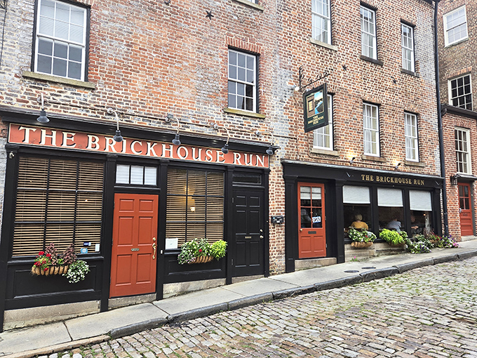 Historic charm meets culinary magic where those bright red doors practically shout, "Come in, the cobblestones have been waiting for you!"