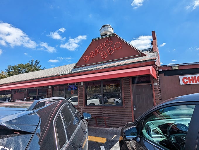 Neon dreams come true! Shiver's BBQ beckons hungry souls with its vibrant sign, promising a smoky paradise that'll make your taste buds dance.