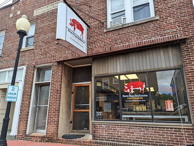 Welcome to hog heaven! Boss Hog Barbecue's unassuming exterior hides a world of smoky delights, proving you can't judge a book by its brick cover.