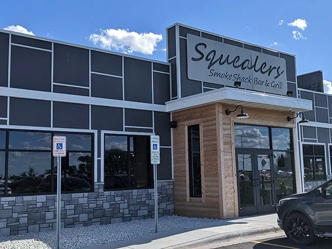 Welcome to BBQ paradise! Squealer's modern exterior belies the smoky, savory delights waiting inside. It's like finding a gourmet food truck parked in the Emerald City.