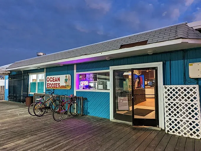Welcome to Ocean Eddie's, where the blue exterior is as inviting as a cool ocean breeze on a scorching summer day.