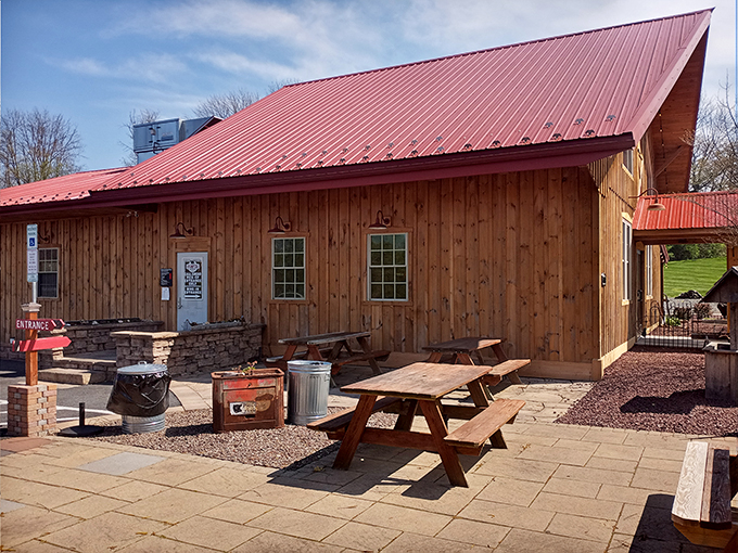 Welcome to meat paradise! This rustic barn-like exterior promises smoky delights that'll make your taste buds do a happy dance.