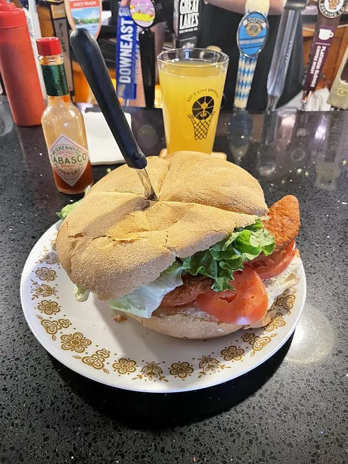 The Buffalo chicken sandwich: Where bold flavors meet tender chicken. It's like a flavor rodeo in your mouth, and you're holding on for the ride.