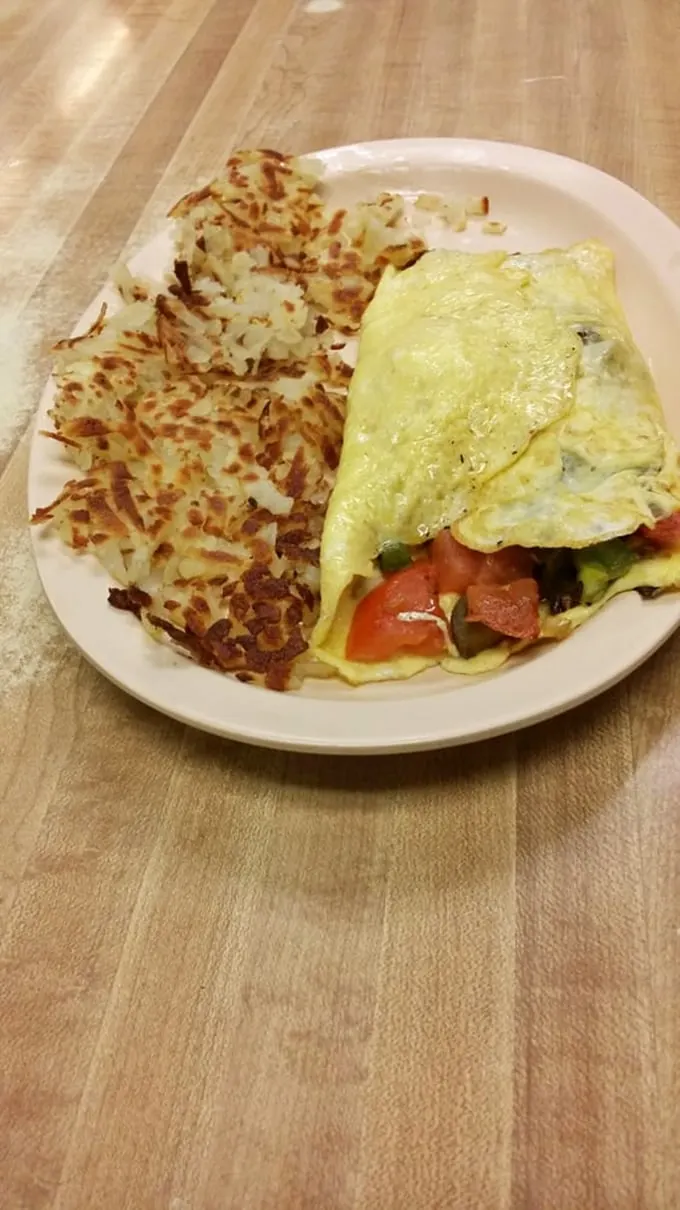 Who says healthy can't be delicious? This veggie-packed omelette proves that even in diner land, you can have your greens and eat them too.