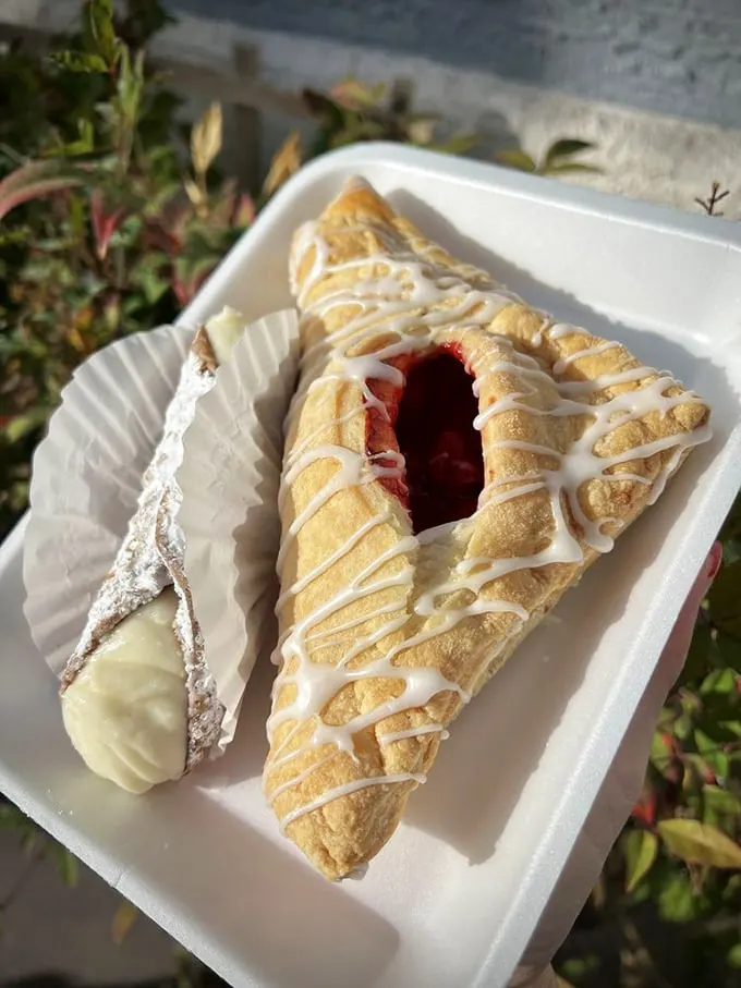 Cannoli and cherry turnover: the dynamic duo of desserts. One's crunchy, one's flaky, both are irresistible – it's a win-win situation for your taste buds.