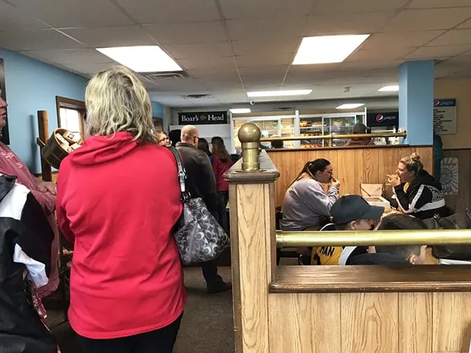 The line for happiness forms here. These folks know that good things come to those who wait... for freshly baked treats.