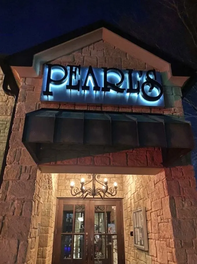 Lights, camera, seafood action! Pearl's entrance is like a beacon for hungry sailors... and Oklahomans.