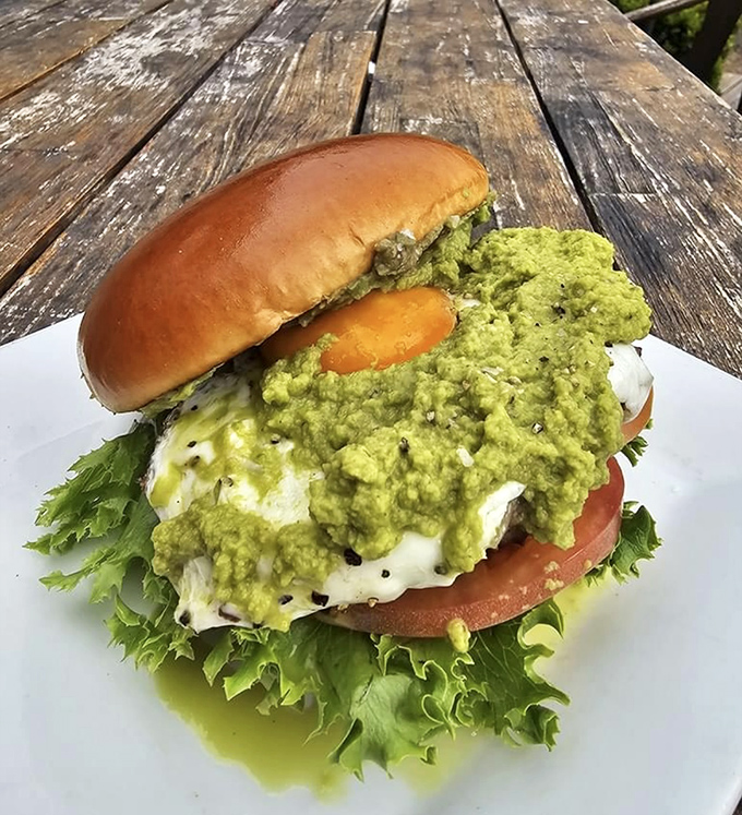 Holy guacamole! This green giant of a burger is proof that sometimes, more is more. It's like your favorite taco and burger had a delicious love child.