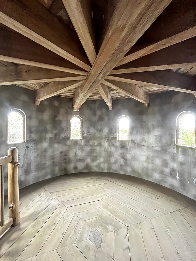 Look up and marvel! This intricate wooden ceiling is a geometric feast for the eyes – no court jester needed for entertainment.
