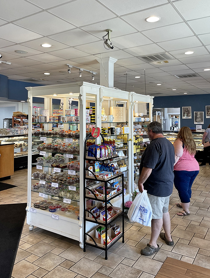 Treasure hunters at work! These folks know that the best gems in town are found behind glass cases, not in jewelry stores.