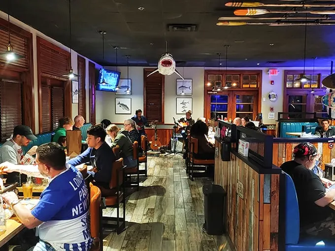 "Happy diners, shark decor, and seafood galore. It's like 'Jaws,' but with a much happier ending!"
