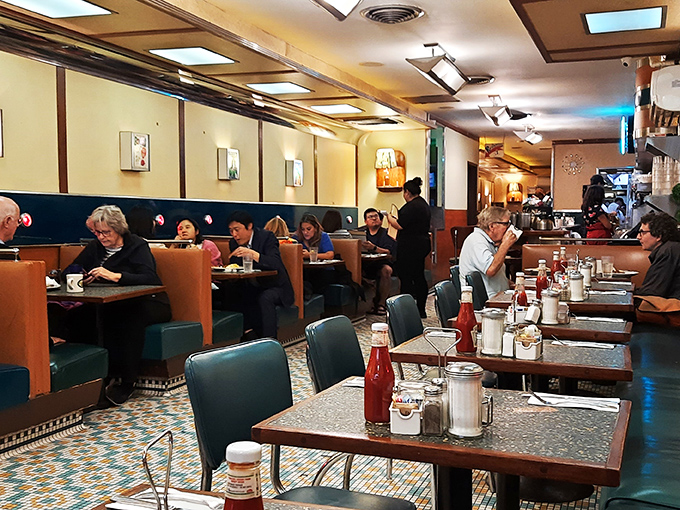 A slice of Americana, served with a side of friendly chatter. It's not just a meal; it's a scene from the sitcom of your life.