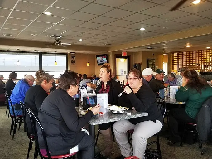 Conversations flow as freely as the coffee refills. These tables have heard more Kansas stories than the state historical society.