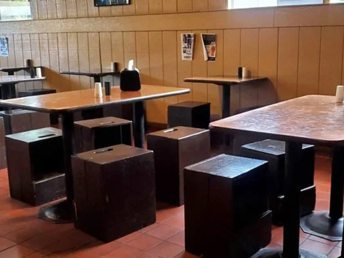 Pull up a seat in burger heaven! These tables have heard more "mmms" than a meditation retreat.
