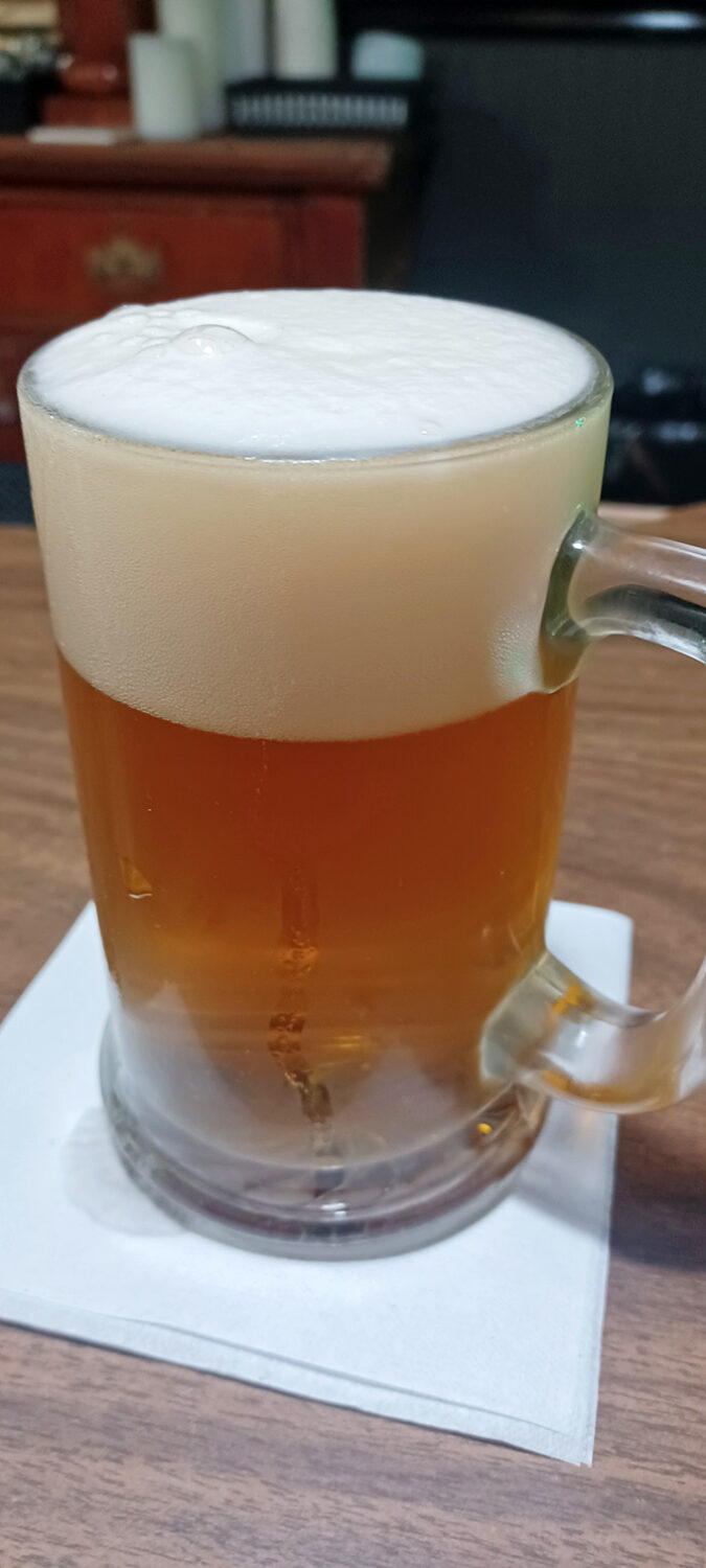 Foam sweet foam! This frothy mug of beer is the perfect dance partner for Andy's pizza – they should really be on "Dancing with the Stars."