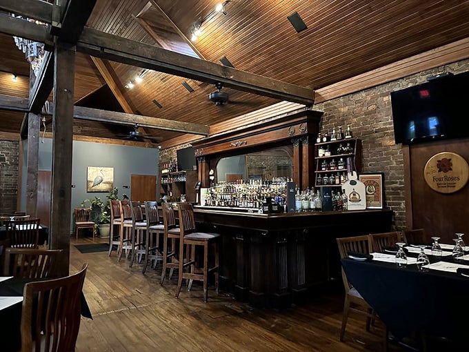 A bar so inviting, it could make a teetotaler reconsider. With bottles gleaming like jewels, it's a liquid treasure trove waiting to be explored.