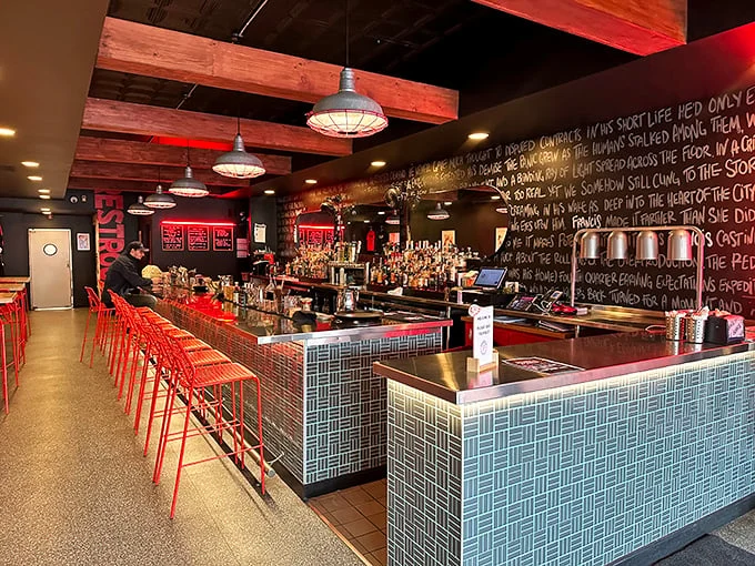 Pull up a stool and prepare for flavor! This bar area isn't just serving drinks; it's dishing out burger dreams and friendly banter.