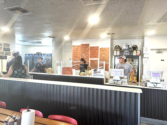 Where the magic happens—watching your order being sliced at this counter is like front-row seats to a carnivorous ballet.