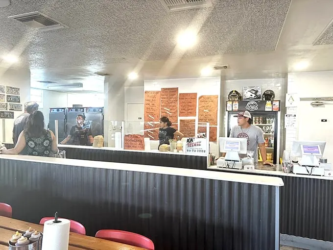Where the magic happens—watching your order being sliced at this counter is like front-row seats to a carnivorous ballet.
