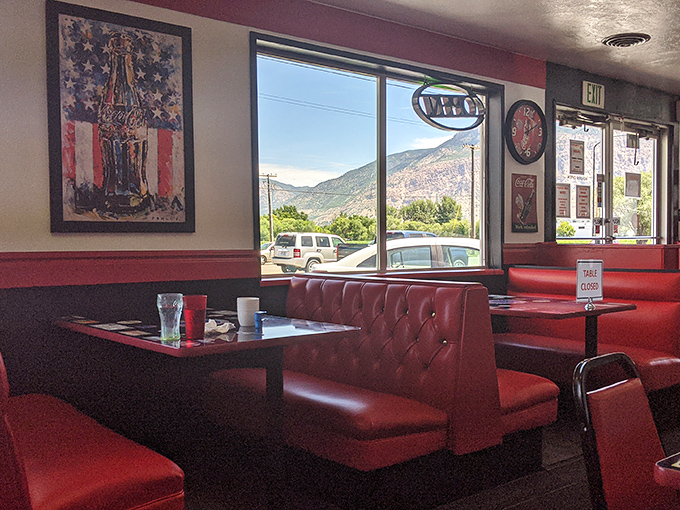 A dining area with a view that says, "Yes, you can have your omelet and eat it too, all while gazing at majestic mountains."