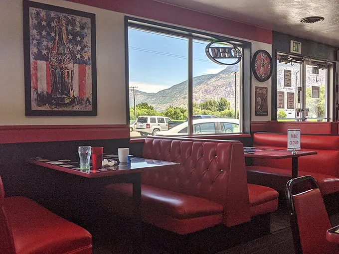 A dining area with a view that says, "Yes, you can have your omelet and eat it too, all while gazing at majestic mountains."