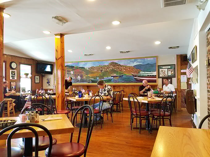 Where strangers become friends over flapjacks! This dining area isn't just serving meals; it's dishing out community spirit with a side of syrup.