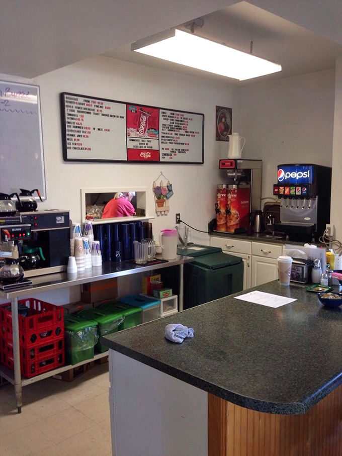 Where the magic happens: This bustling kitchen is the heart of Sommerset Café, pumping out comfort food like a well-oiled machine.