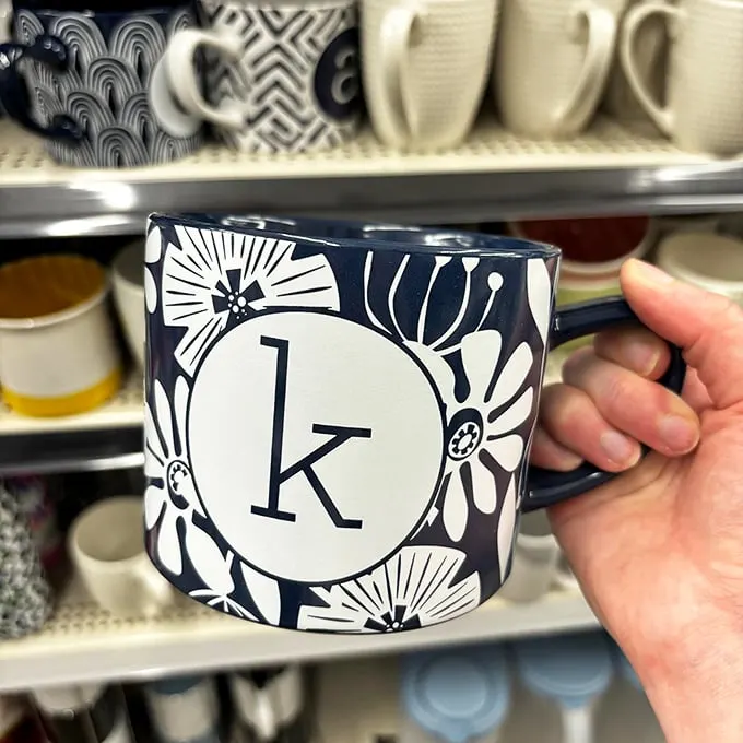 Mug shot of the day! This floral initial cup has more personality than a talk show host and is ready for its coffee close-up.