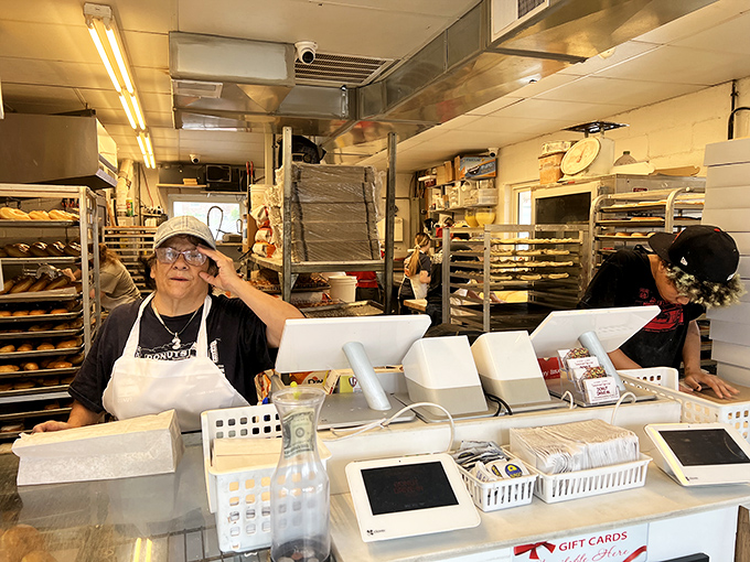 Masters of the donut domain! These aren't just staff; they're wizards, conjuring up spellbinding treats with a smile.