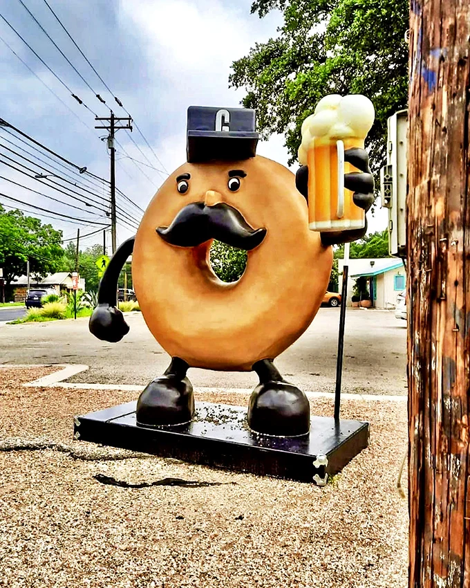 Meet the unofficial mayor of Flavortown! This mustachioed mascot is here to guide you through your donut-fueled adventure.