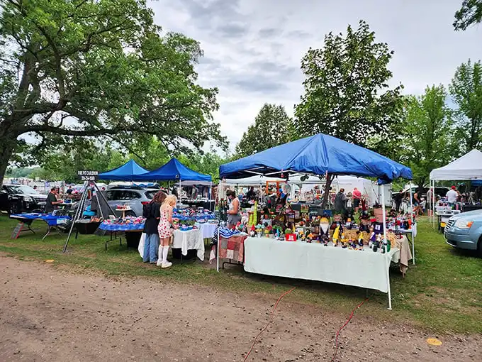 Under Minnesota's summer canopy, vendors create miniature worlds of possibility. Every tent holds different promises.