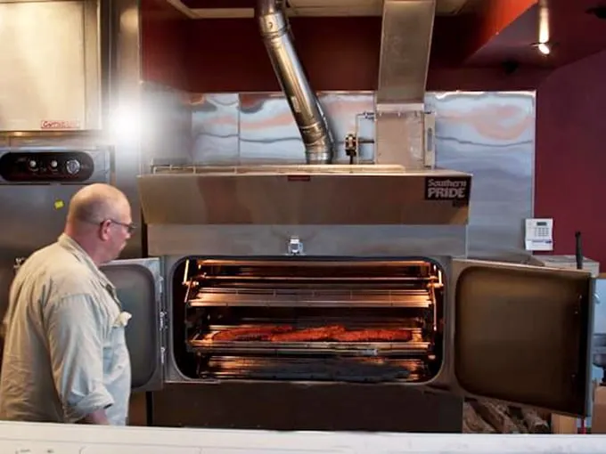 The heart of the operation: where smoke meets meat. It's like a tanning bed for brisket, but way more delicious.