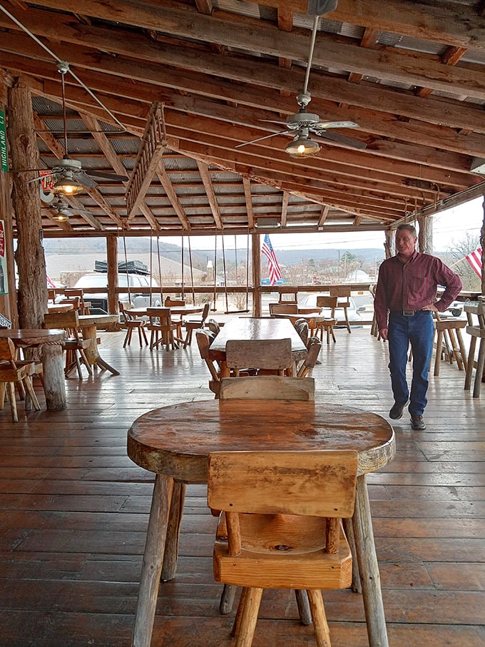 The covered porch dining area offers Ozark views with your meal—nature's television playing while you feast on Arkansas comfort food.