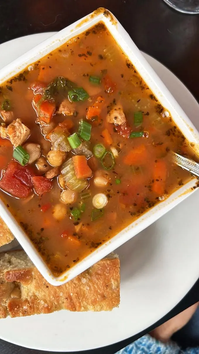 Soup-er hero to the rescue! This hearty bowl of chicken chickpea goodness is here to save you from hunger, one spoonful at a time.