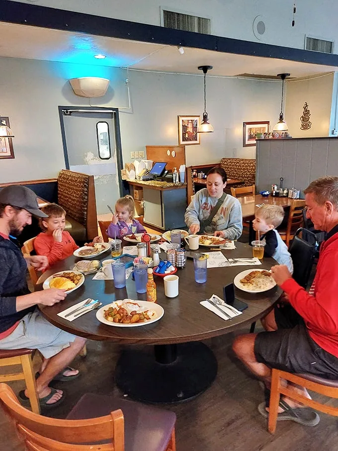 Family, food, and fun – the holy trinity of dining out. This table scene captures the essence of Village Kitchen's warm atmosphere.