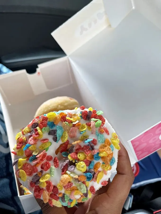 Fruity Pebbles donut: because sometimes, you need your breakfast cereal and your dessert to join forces. It's a party for your palate!