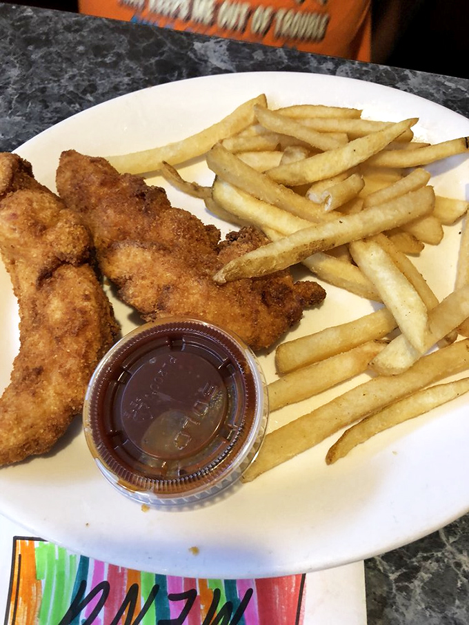 Kid-approved and adult-envied! These chicken tenders and fries are a surefire way to make the little ones smile.