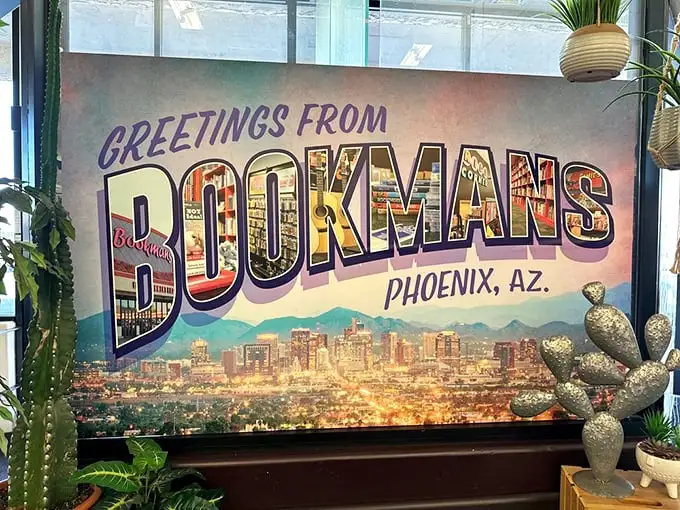 Greetings from book paradise! This postcard-perfect sign captures the essence of Bookmans – where Phoenix's skyline meets a sky-high stack of stories.