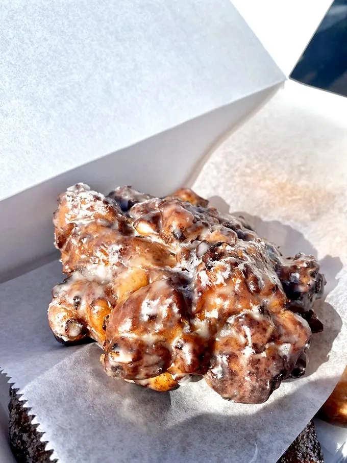 Holy fritter, Batman! This apple fritter looks like it could single-handedly solve world peace – or at least make your taste buds incredibly happy.